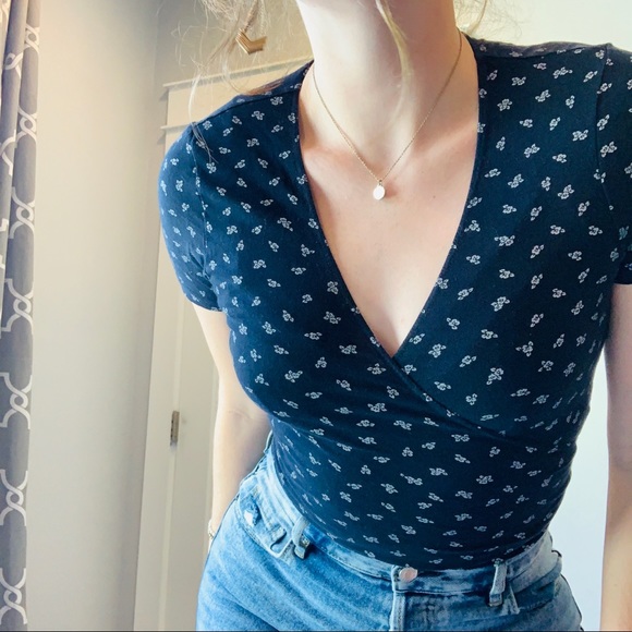 Tops | Brandy Melville White Floral Zelly Wrap Top Navy | Poshmark